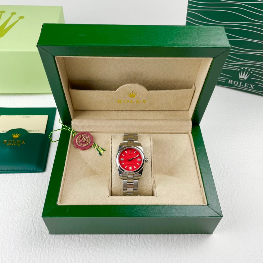 Rolex Oyster Perpetual “Red Dial” - Hollo